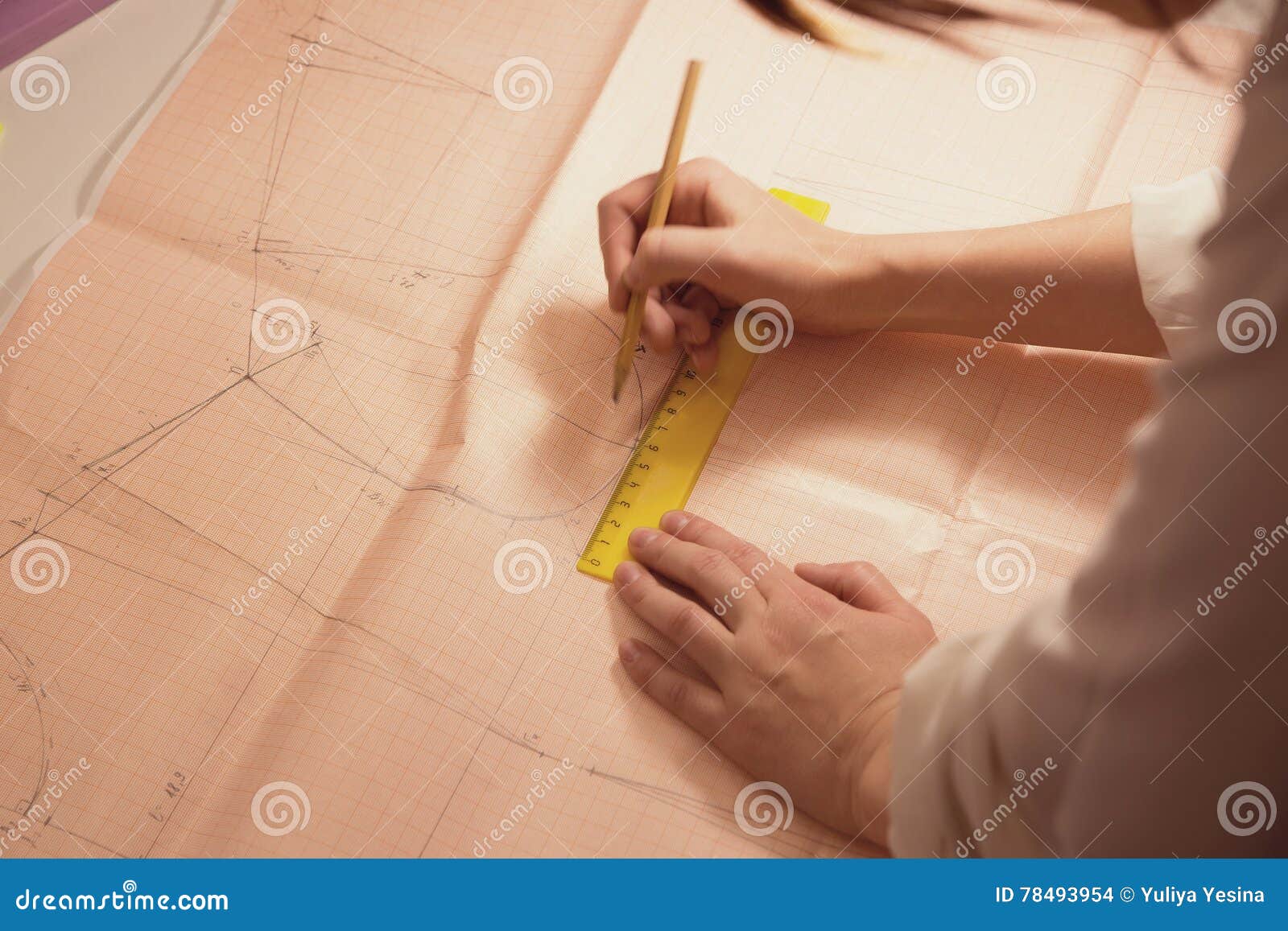 Woman Drawing on Graph Paper Stock Photo - Image of elevation, fabric ...