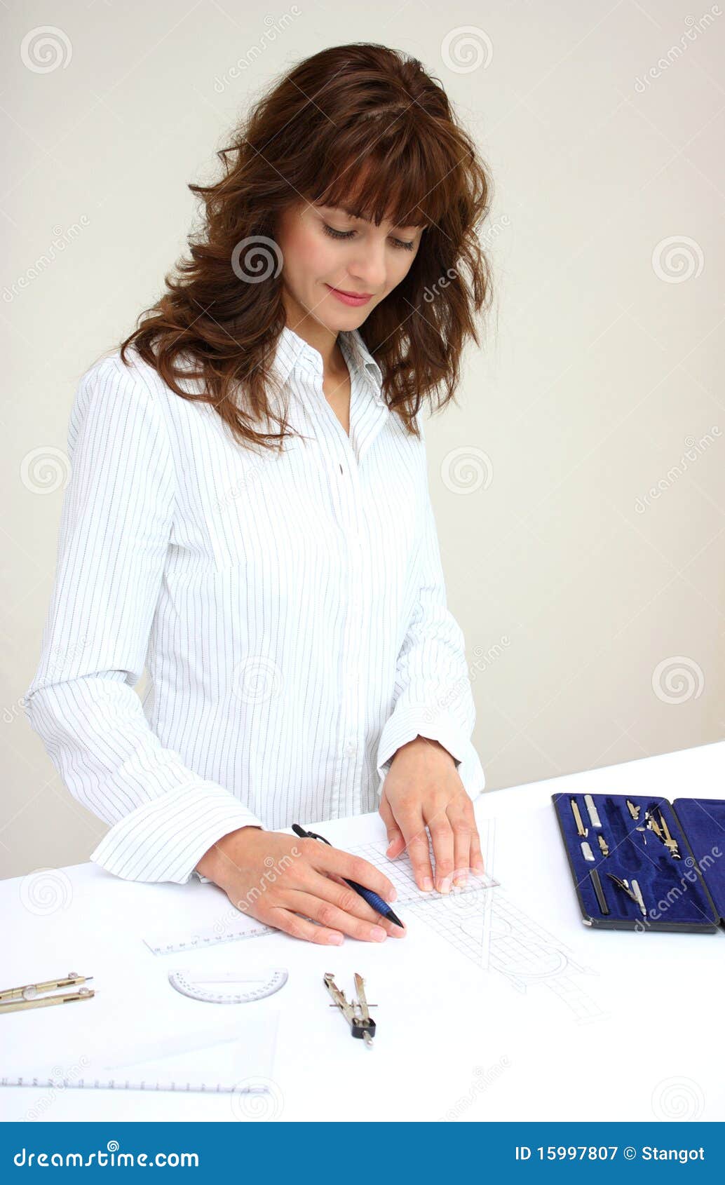 A woman drawing a project stock image. Image of plan - 15997807