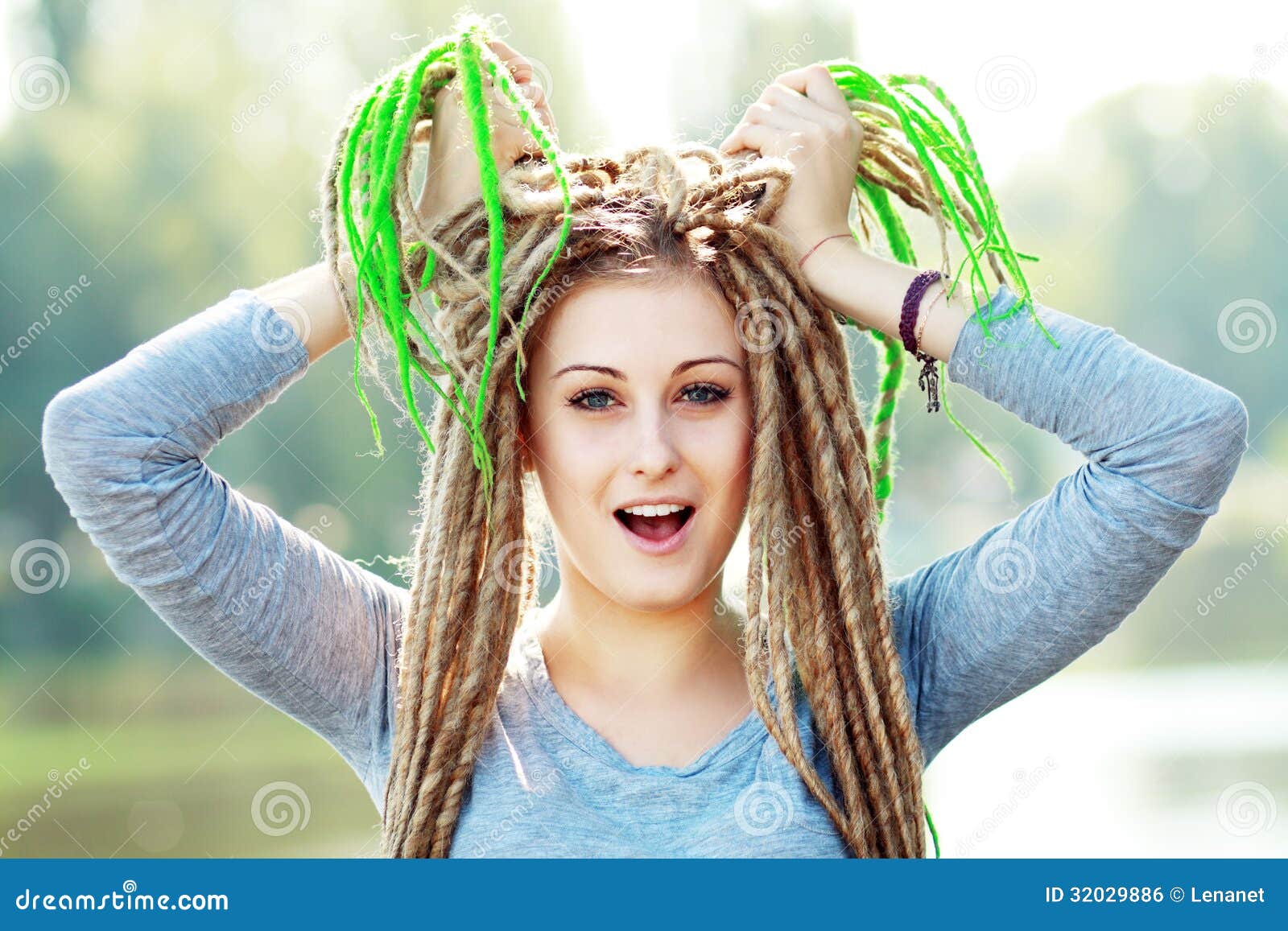 Woman with Dreads Making Face Stock Photo - Image of adornment, blue ...