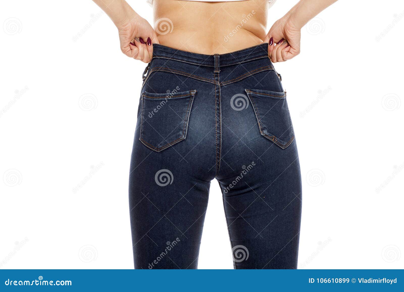 Woman dressing her jeans stock image. Image of putting - 106610899