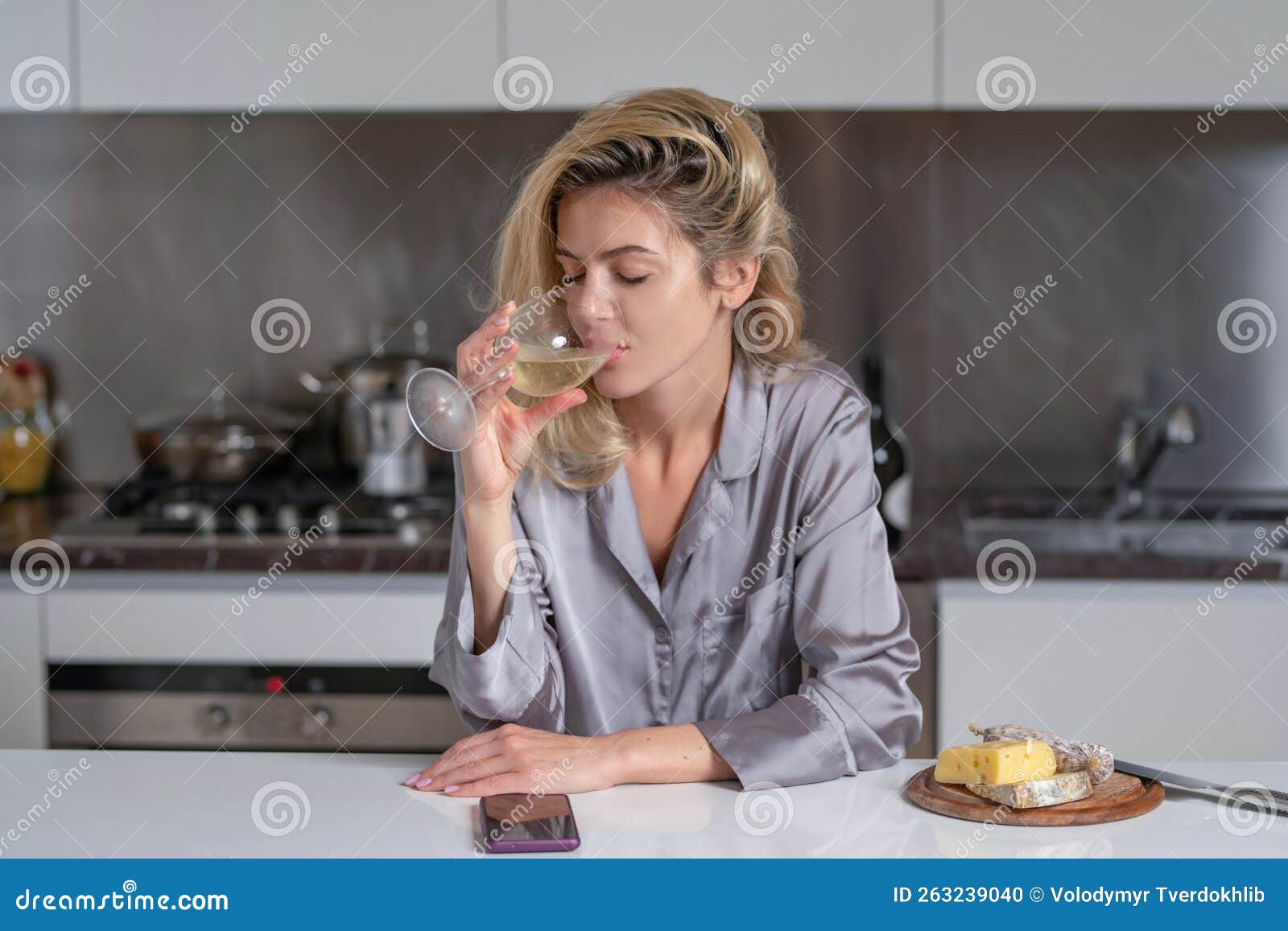 Woman Drink Wine in a Kitchen. Alcohol Abuse. Stock Photo - Image of ...