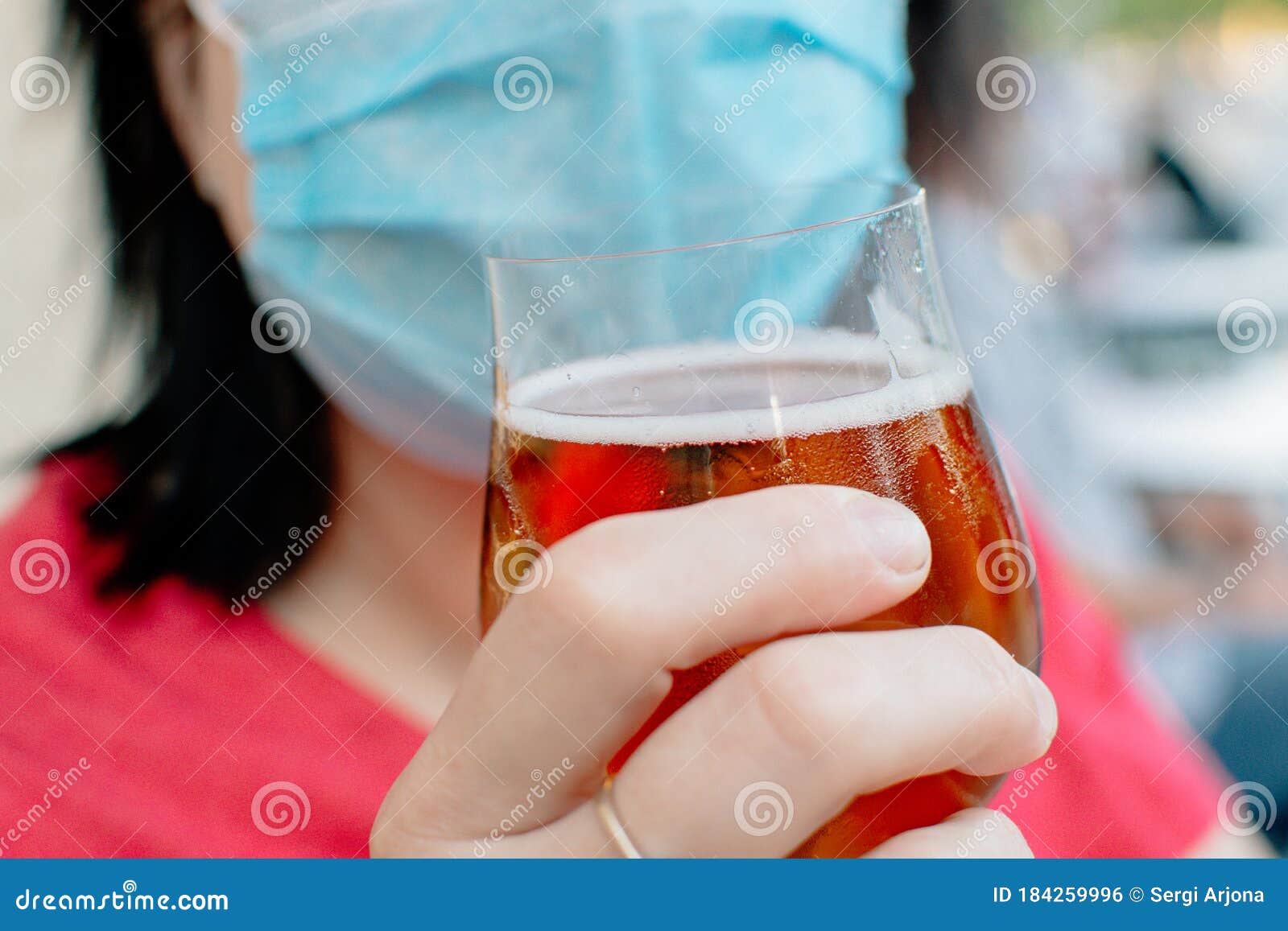 Woman Drinking a Beer with Protective Face Mask on Stock Photo - Image ...