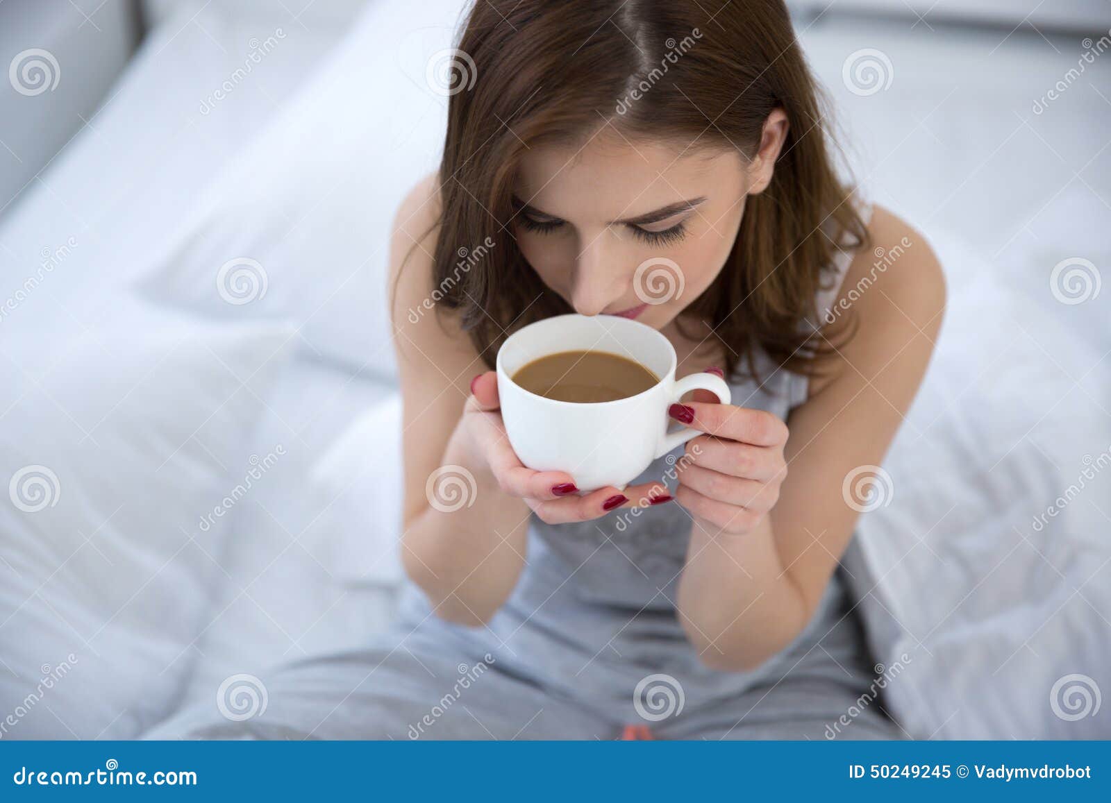 Woman Drinking Coffee on the Bed Stock Image - Image of people, healthy ...