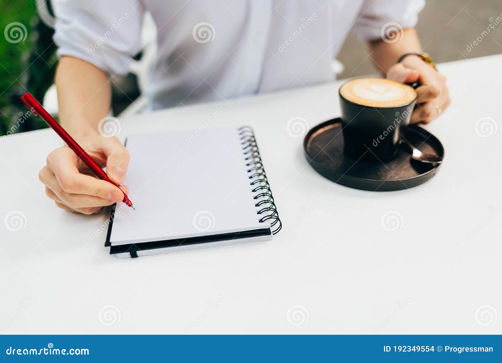 Woman Drinking Coffee and Making Notes Stock Photo - Image of shirt ...