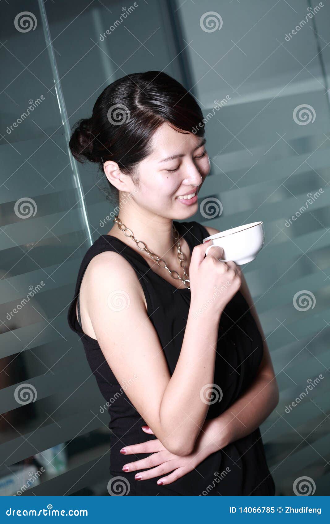 Woman Drinking Coffee at Office Stock Image - Image of model, drinking ...