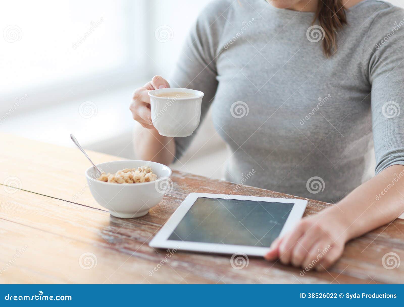 Woman Drinking Coffee and Using Tablet Pc Stock Photo - Image of ...