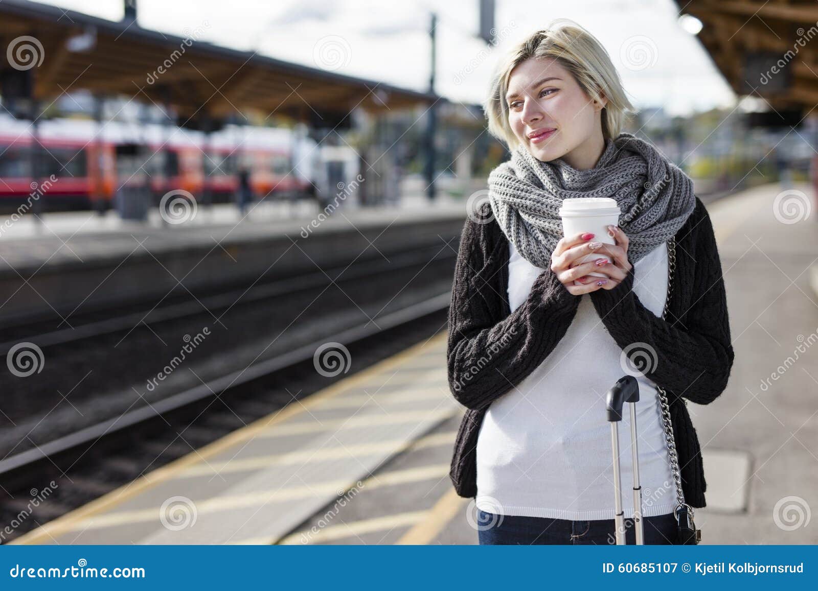 Woman Drinking Coffee while she Waiting for the Train Stock Image ...