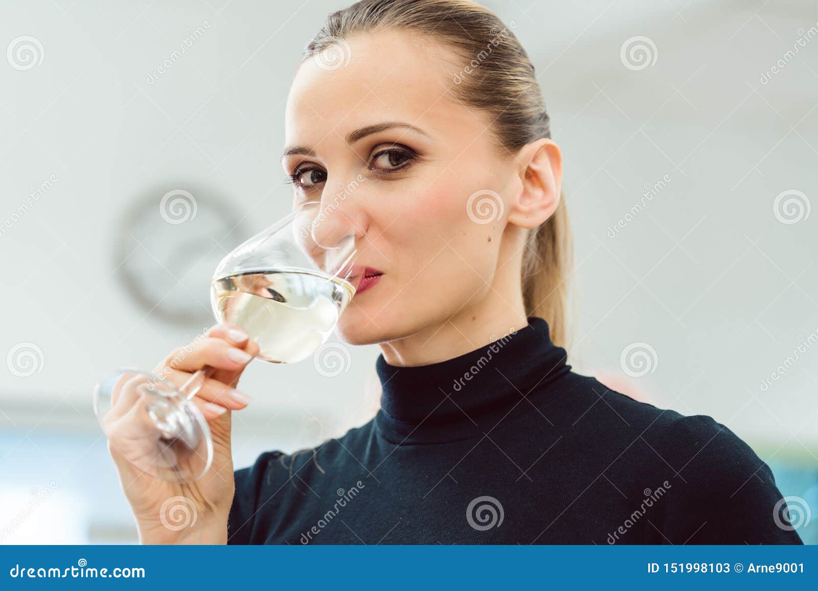 Woman Drinking a Glass of White Wine after Work Stock Image - Image of ...