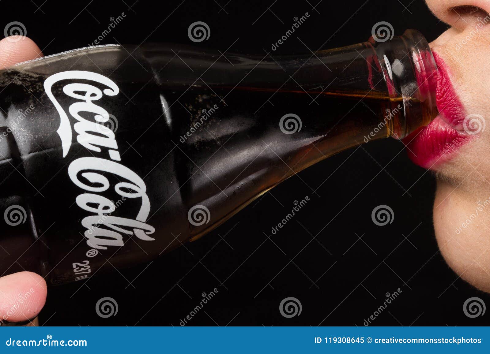 Woman Drinking 237 Ml. Coca-cola Picture. Image: 119308645