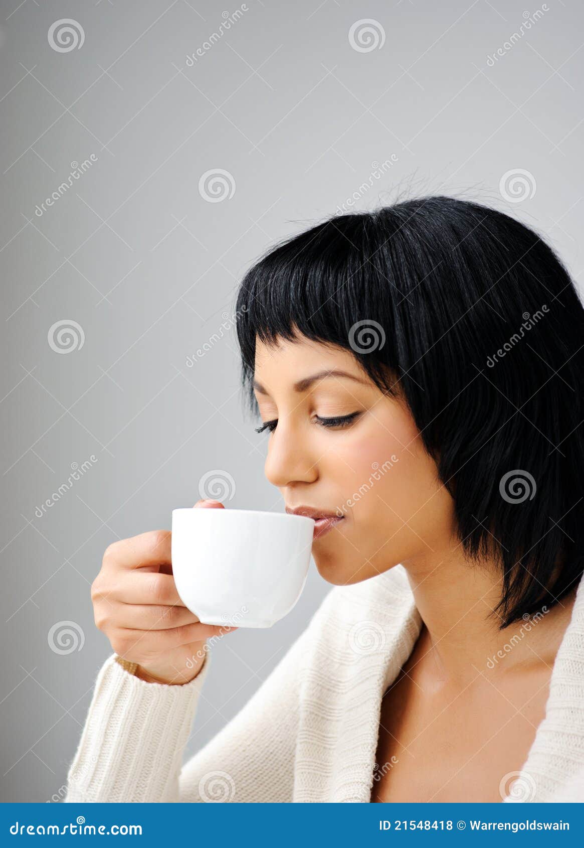 Woman drinking tea stock photo. Image of sitting, beautiful - 21548418