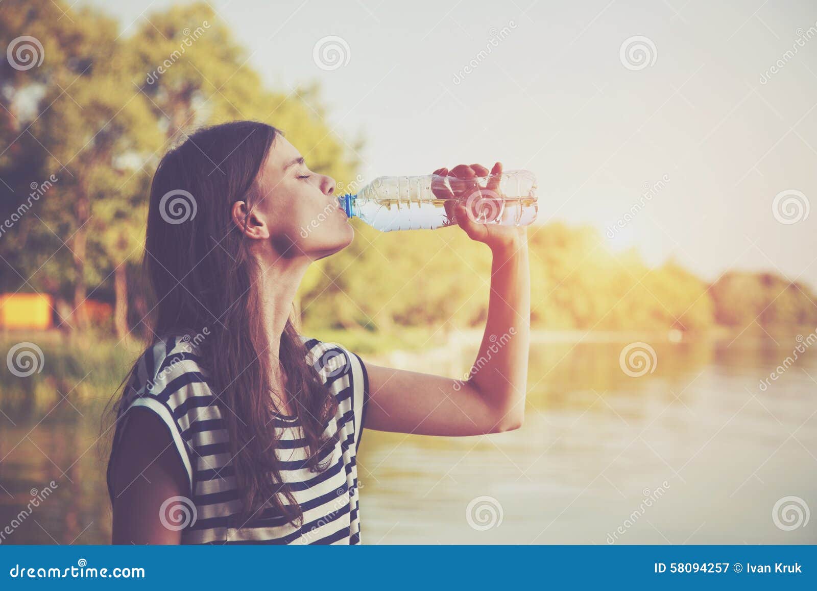 Woman drinking water stock image. Image of bottle, athlete - 58094257