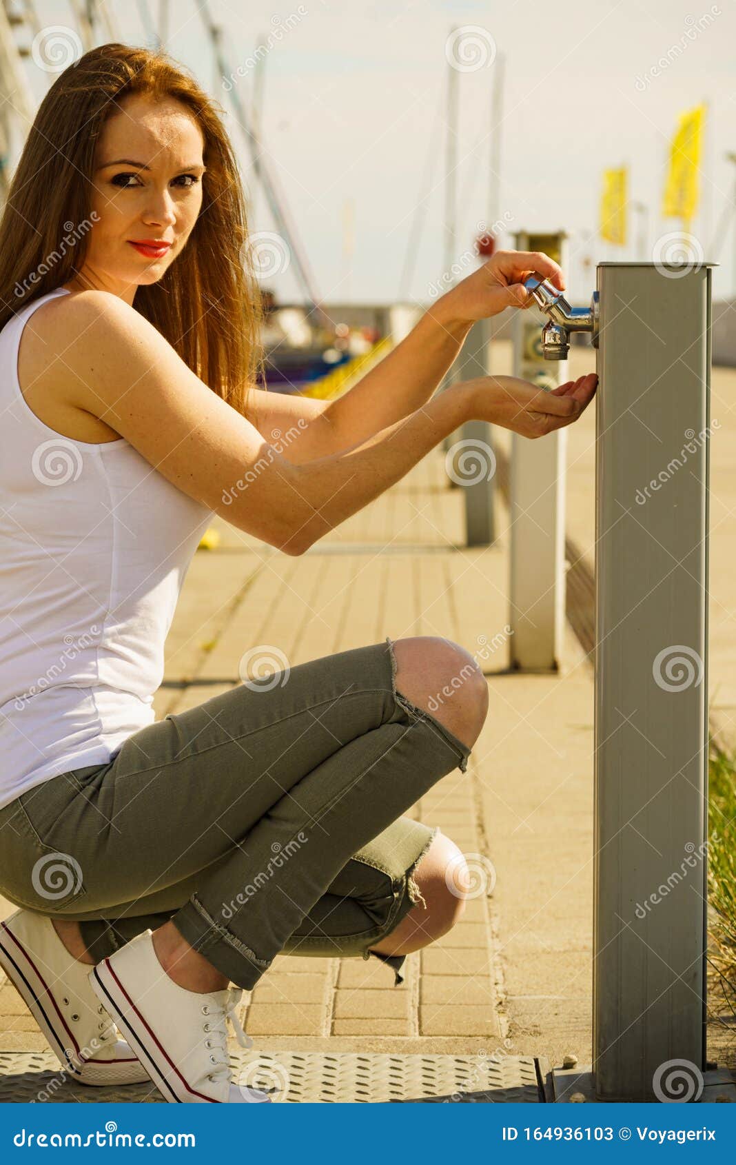 Woman Drinking Water from Tap in Marina Stock Image - Image of summer ...