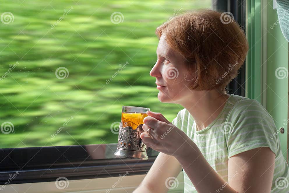 The Woman Drinks Tea in Train Stock Image - Image of adventure ...