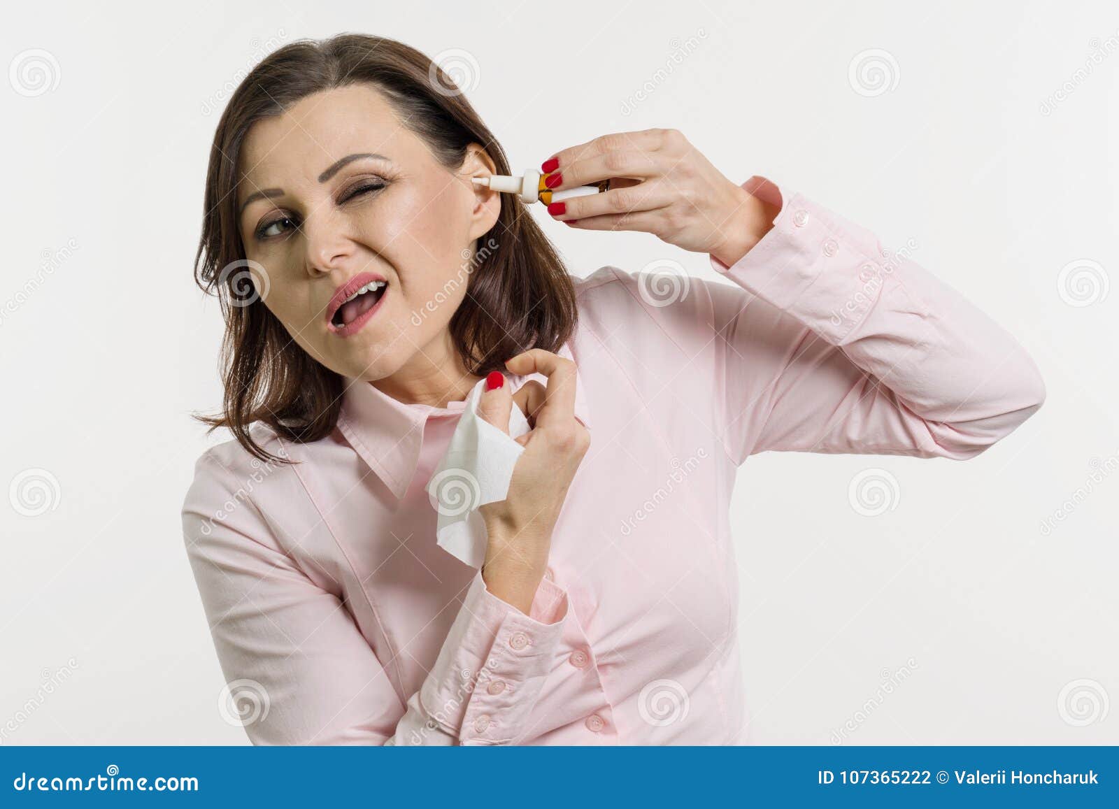 Woman Drips a Drops for Ear. White Background Stock Photo - Image of ...