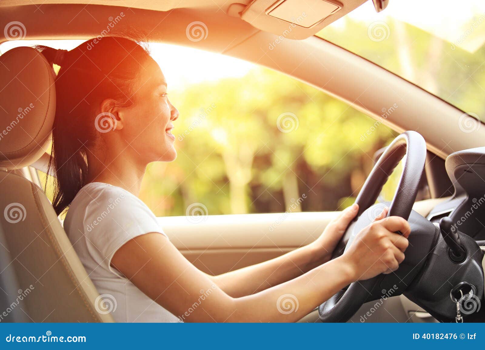 Woman driver driving a car stock photo. Image of seat - 40182476