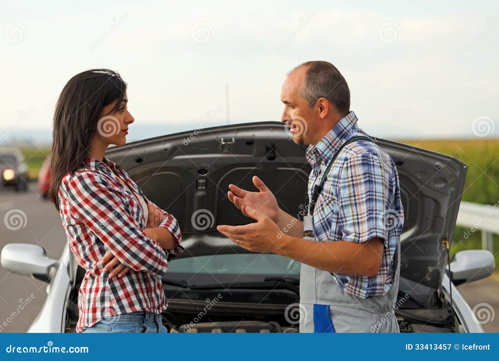 Woman Driver and Repairman in Front of Broken Car Stock Image - Image ...