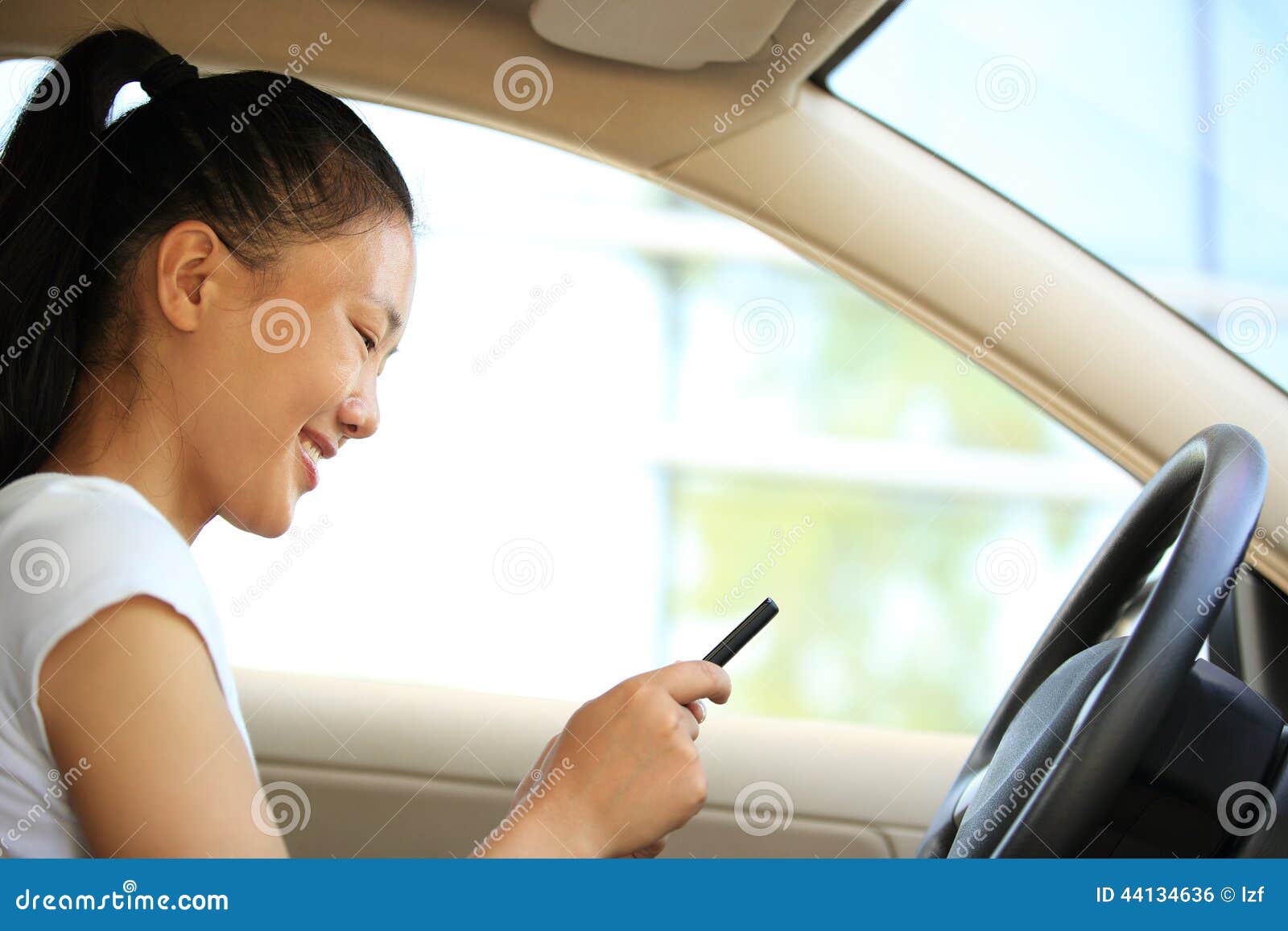 Woman Driver Use Cell Phone in Car Stock Photo - Image of cell, hold ...
