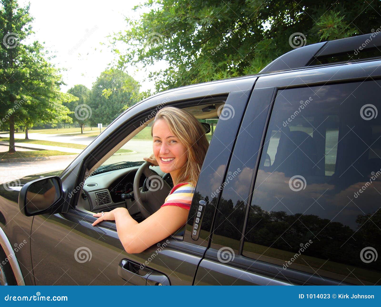 Woman Driving Car stock image. Image of minivan, speed - 1014023
