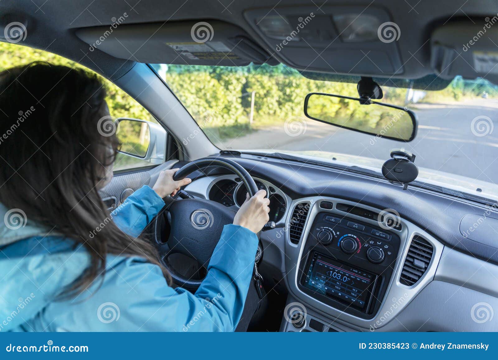 A Woman Driving a Car, a Young Woman Driving Her Car, an Inside View ... A Woman Driving a Car, a Young Woman Driving Her Car, an Inside View ...
