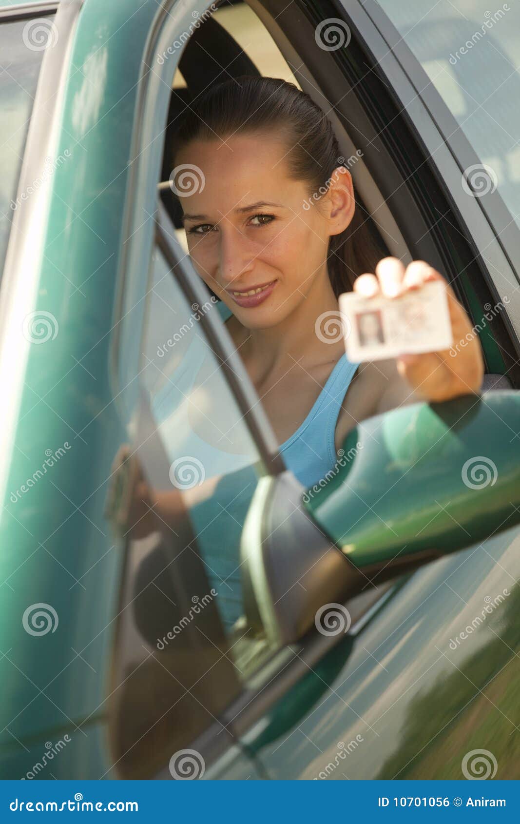 Woman with driving licence stock photo. Image of license - 10701056