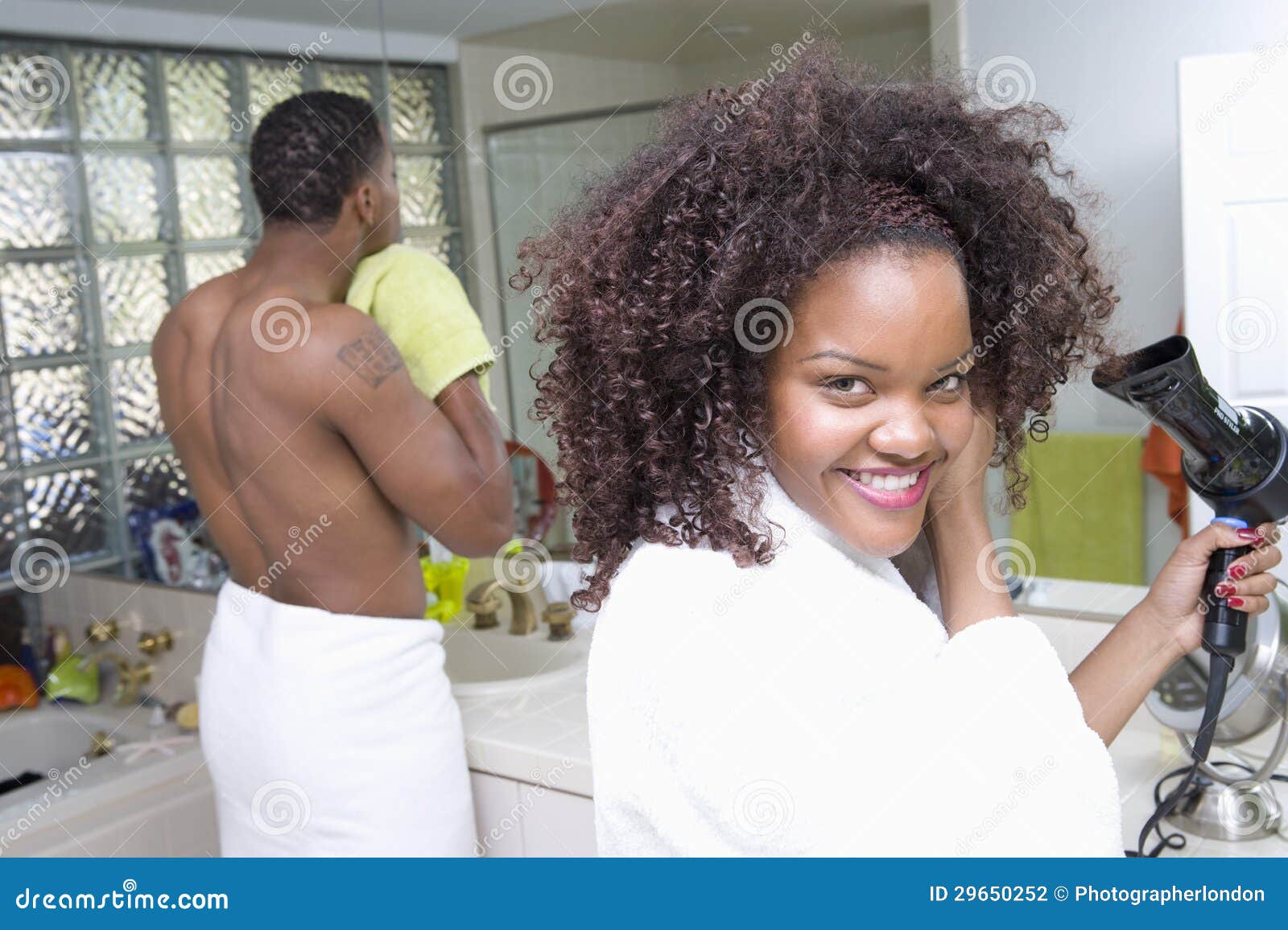 Woman Drying Hair in Bathroom Stock Photo - Image of morning, bathroom ...