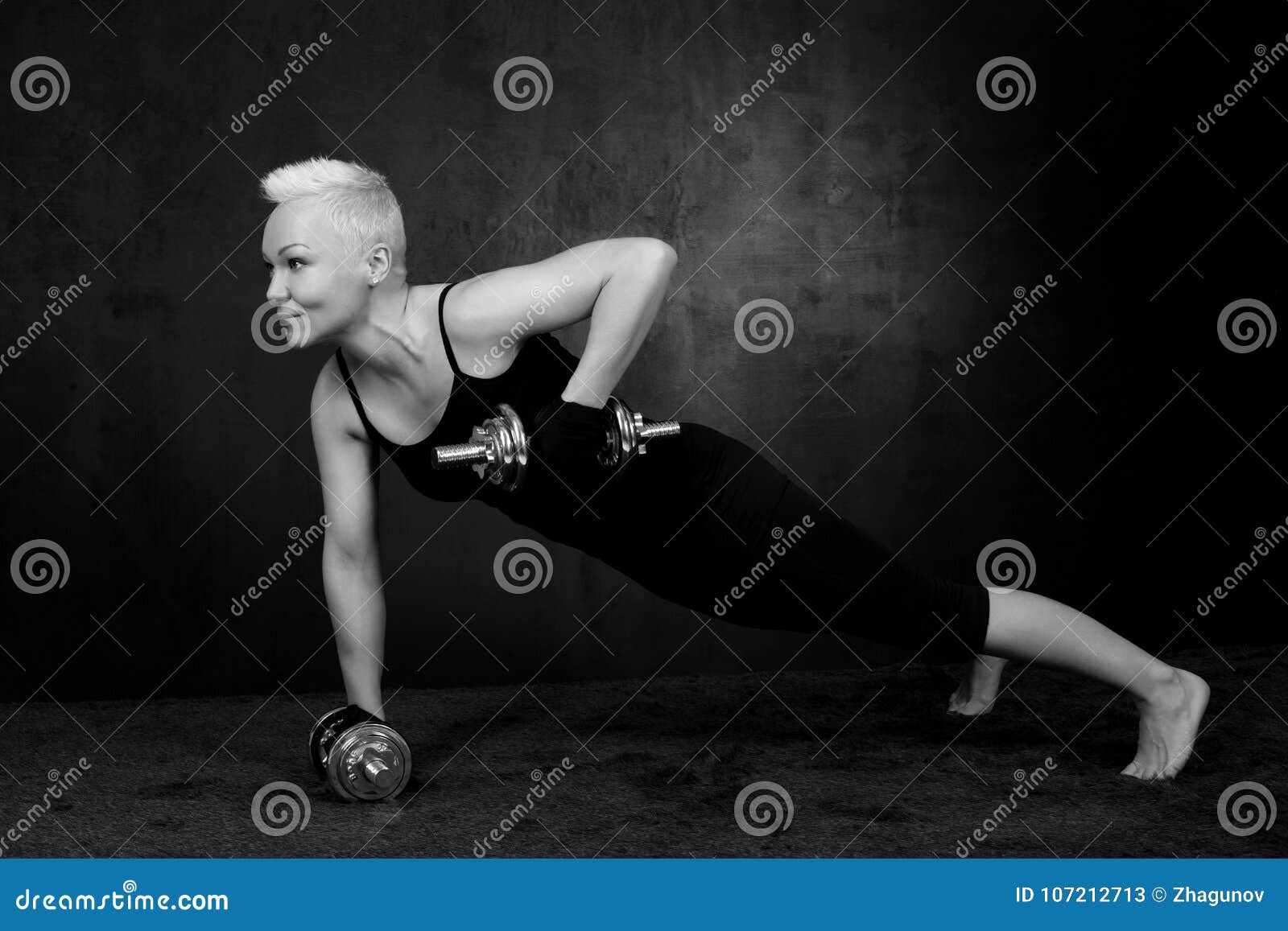 Woman with a dumbbell stock image. Image of adult, caucasian - 107212713