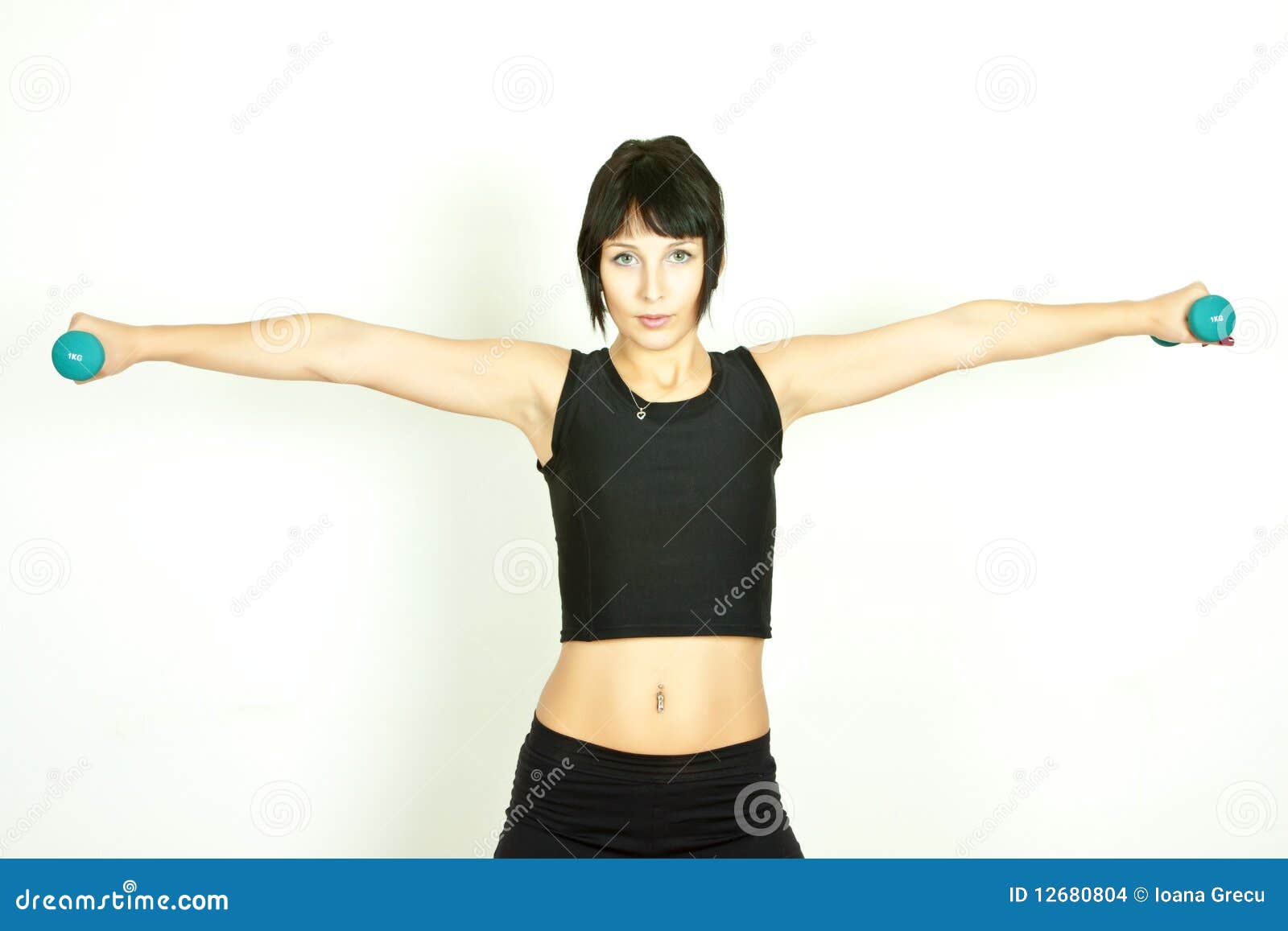 Woman with dumbbells stock photo. Image of woman, white - 12680804