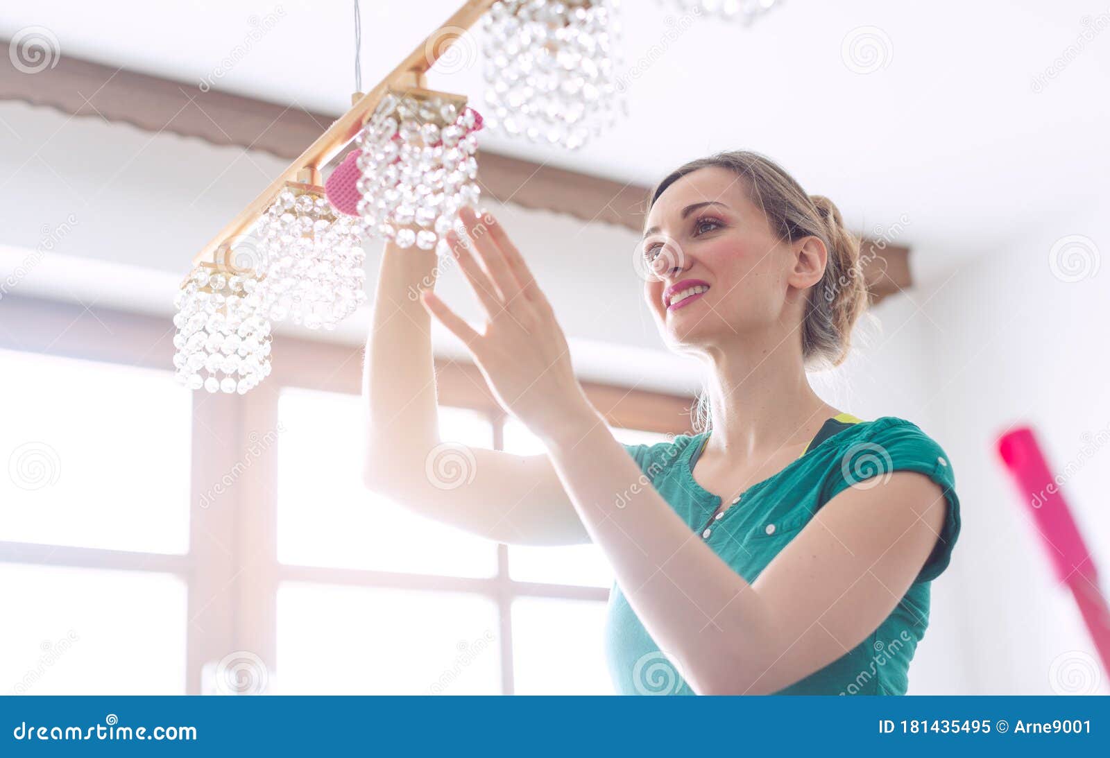 Woman Dusting a Lamp during Spring Cleaning Stock Image - Image of ...