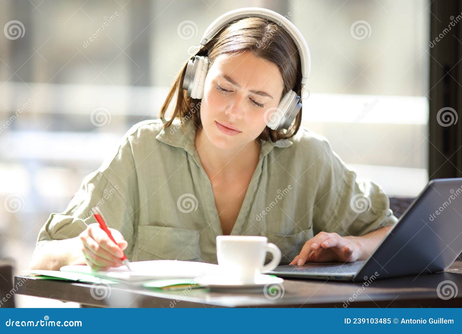 Woman E-learning with Laptop and Headphones Taking Notes Stock Image ...