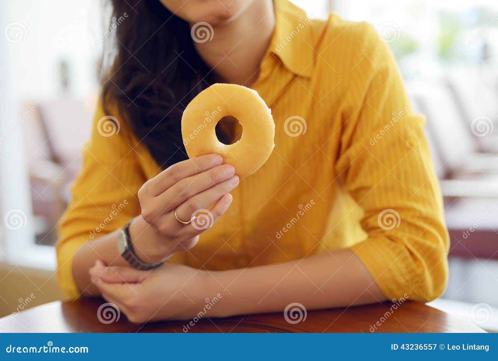 Woman Eat Donut stock image. Image of brunette, restaurant - 43236557