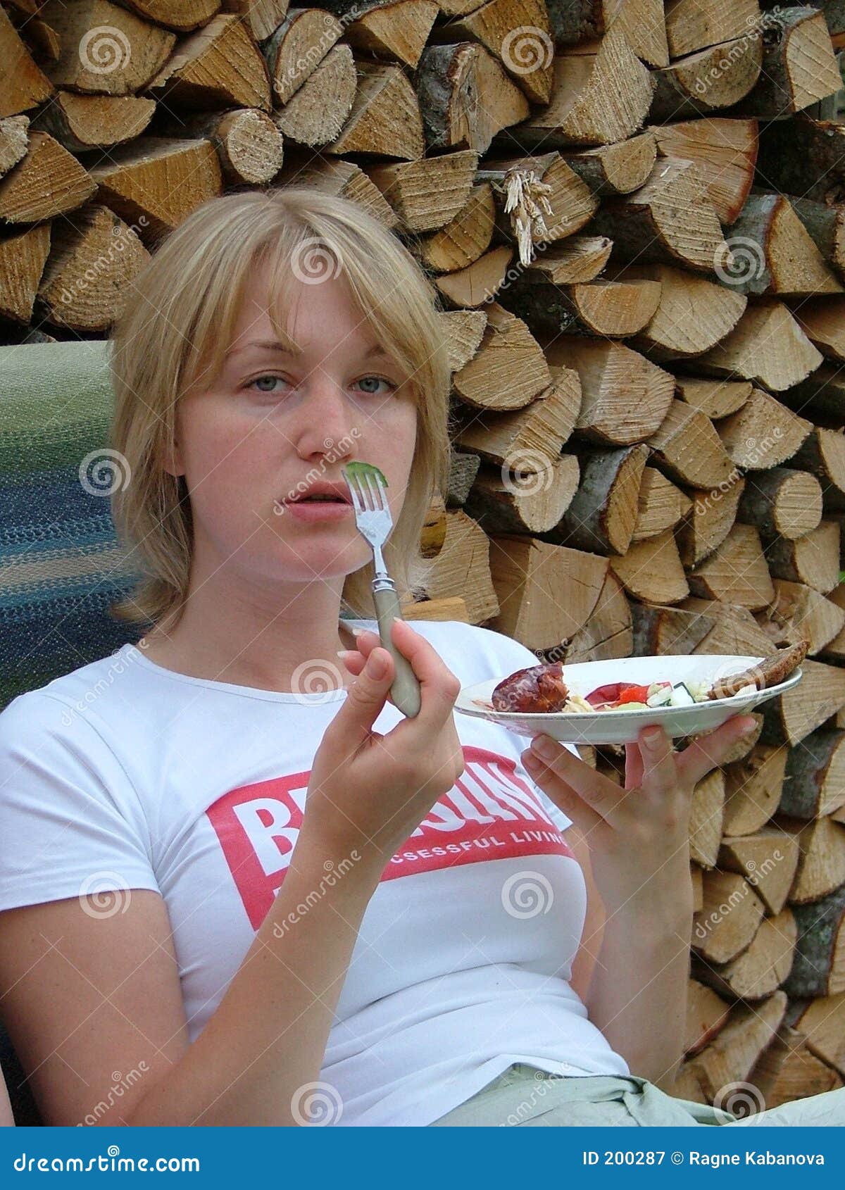 Woman eating stock image. Image of dish, caucasian, blonde - 200287