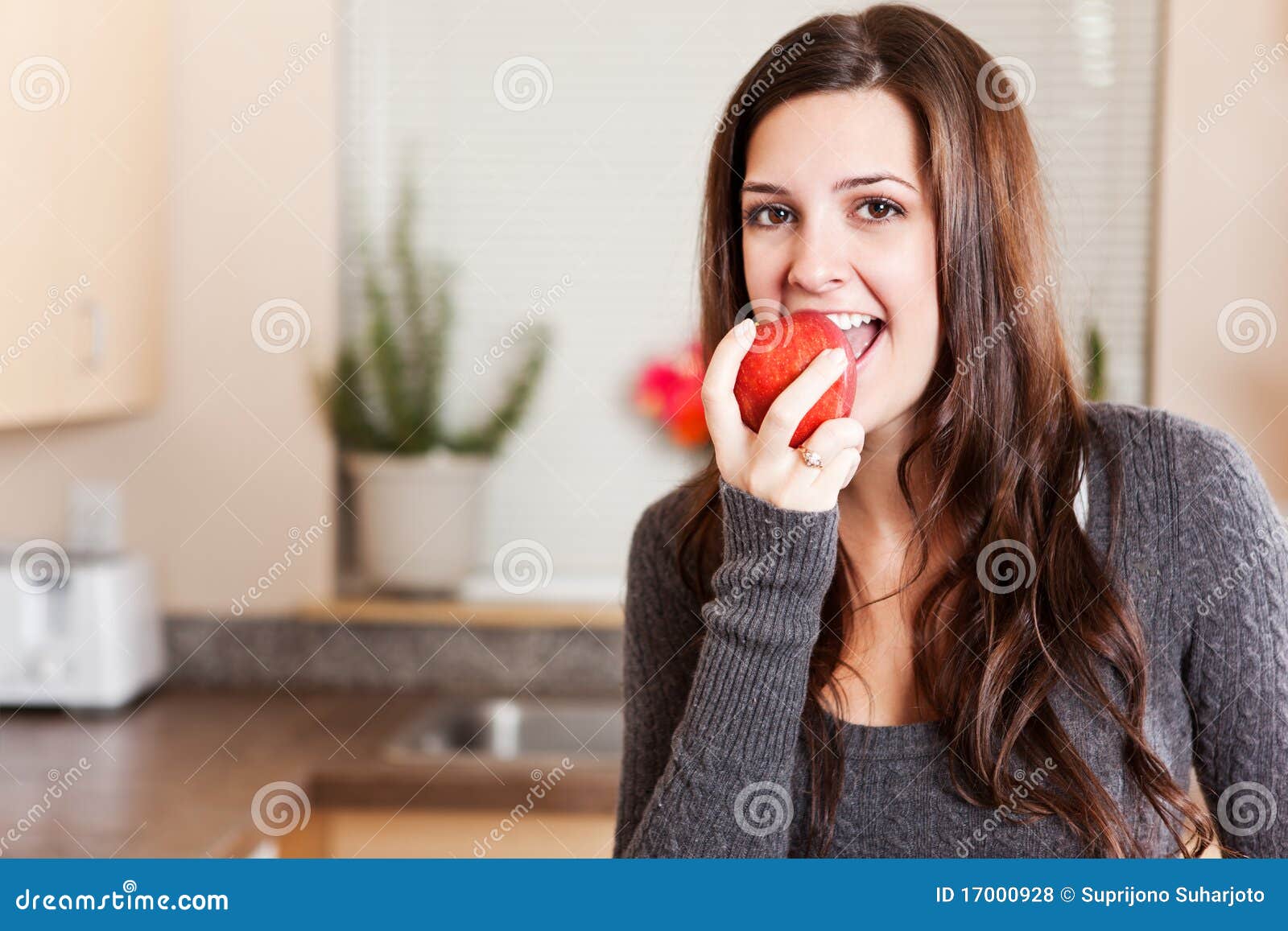 Woman eating apple stock photo. Image of hispanic, eating - 17000928