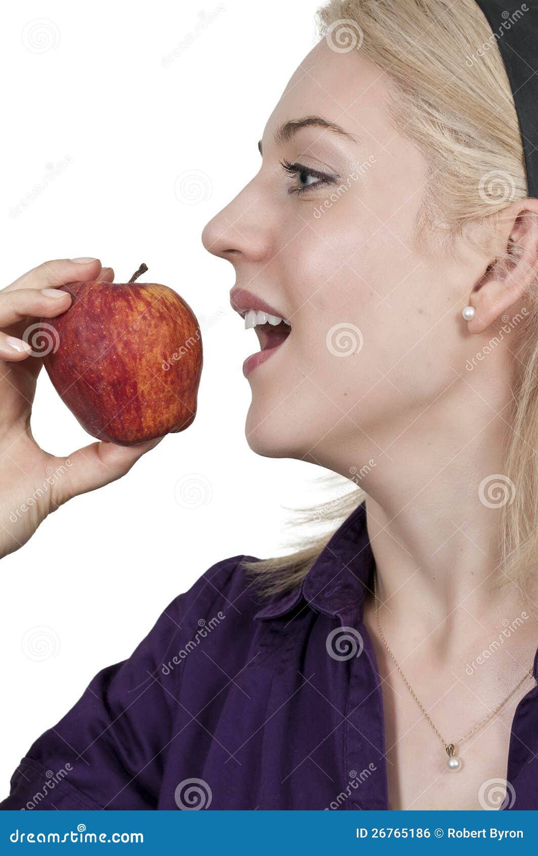 Woman Eating an Apple stock photo. Image of blonde, fruit - 26765186
