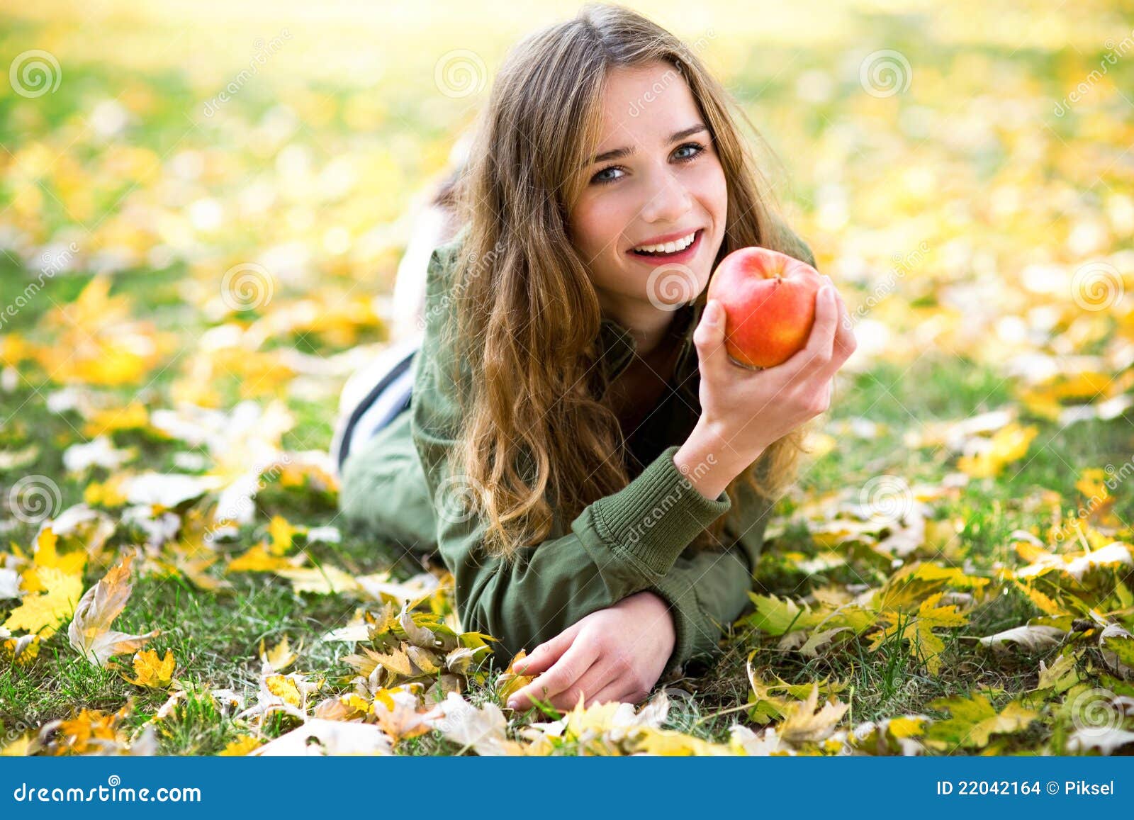 Woman Eating Apple Outdoors in Autumn Stock Photo - Image of girls ...