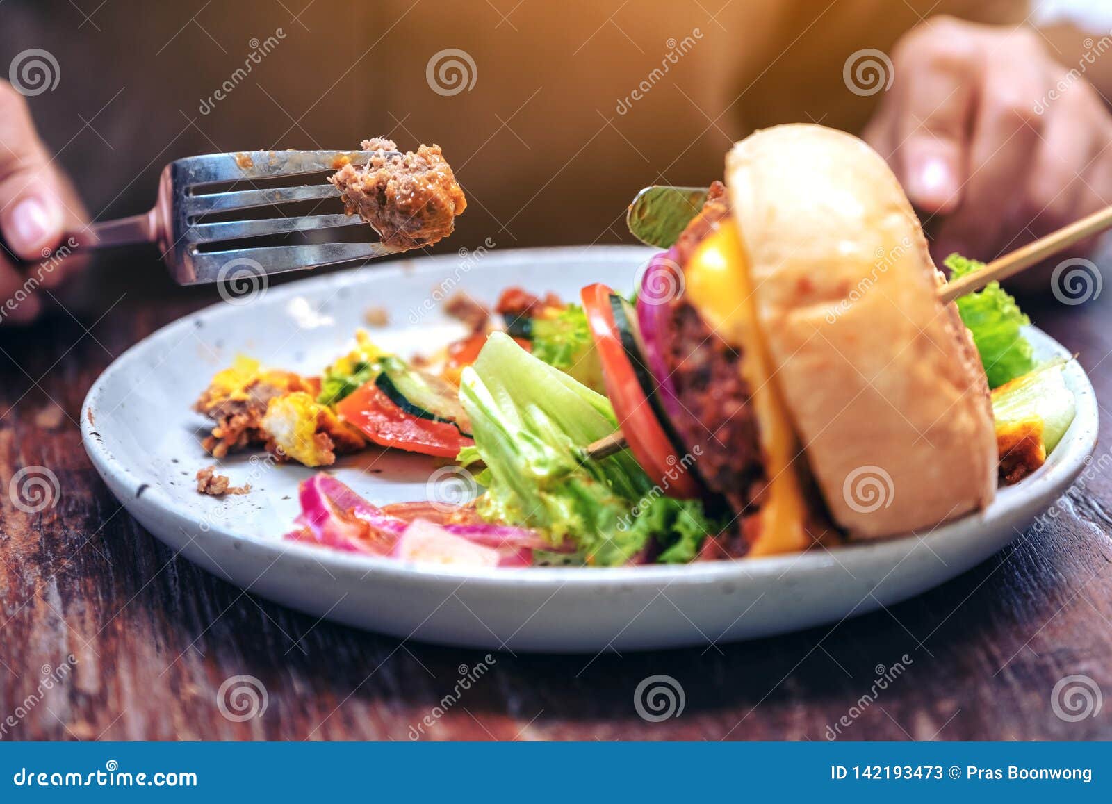 Woman Eating Beef Hamburger with Knife and Fork Stock Image - Image of ...