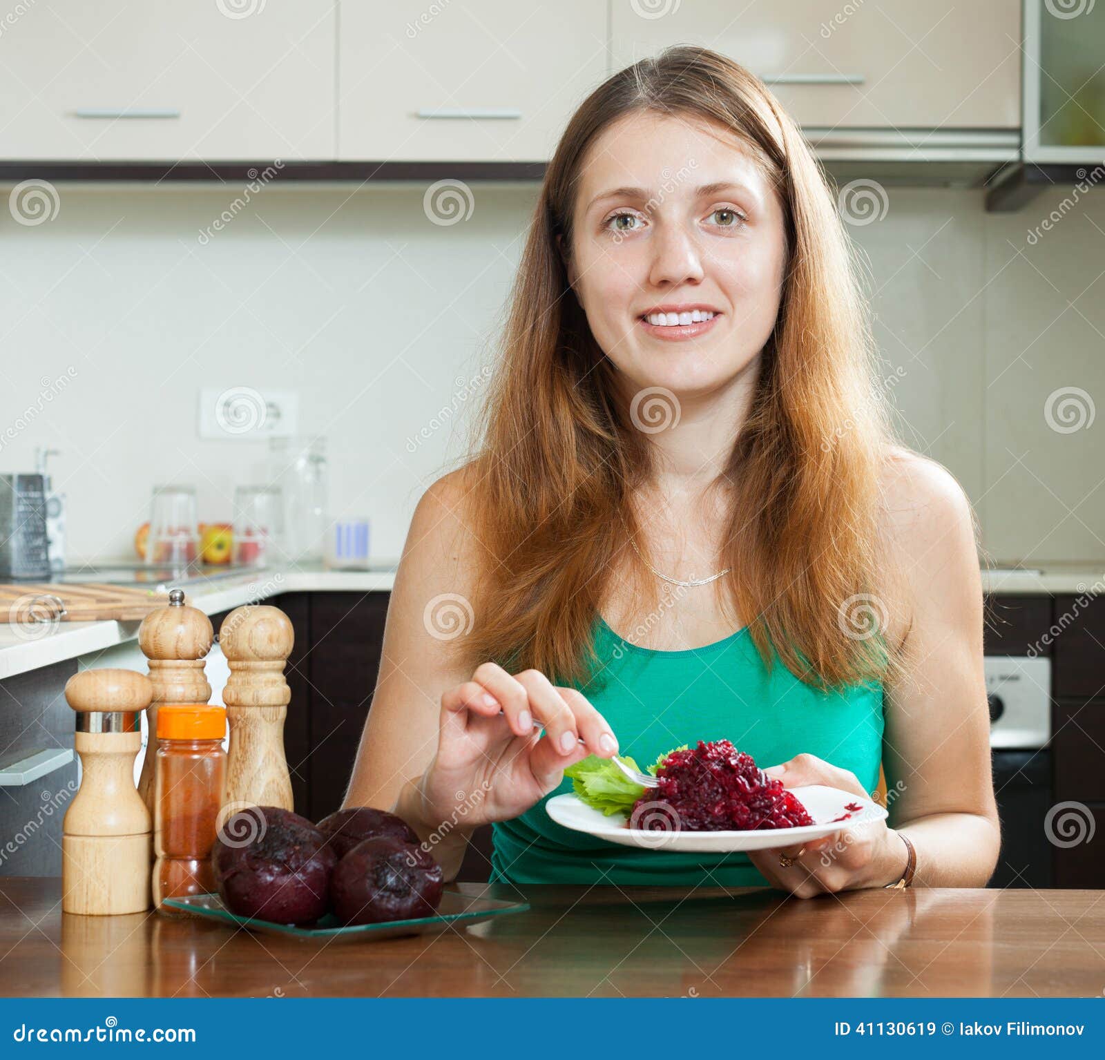 Woman eating boiled beets stock image. Image of grating - 41130619