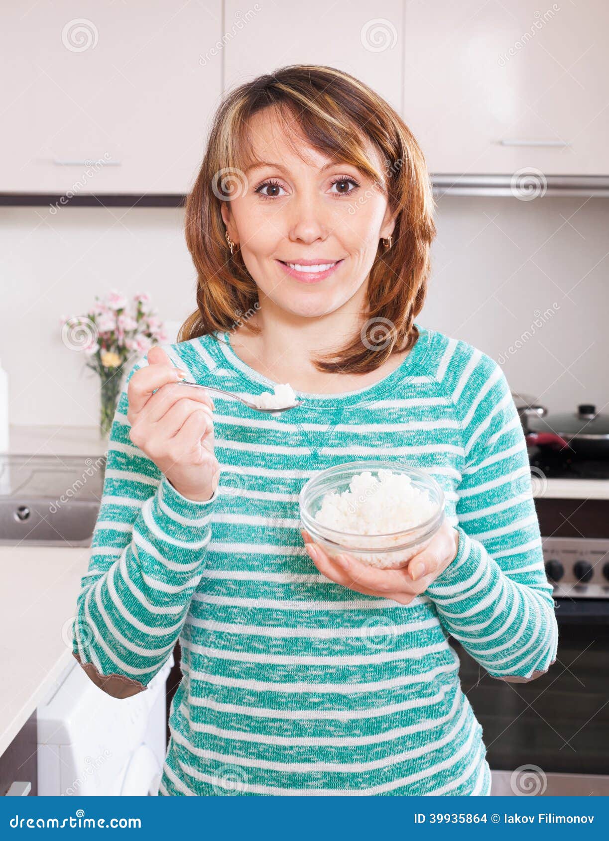 Woman eating boiled rice stock photo. Image of nutrition - 39935864