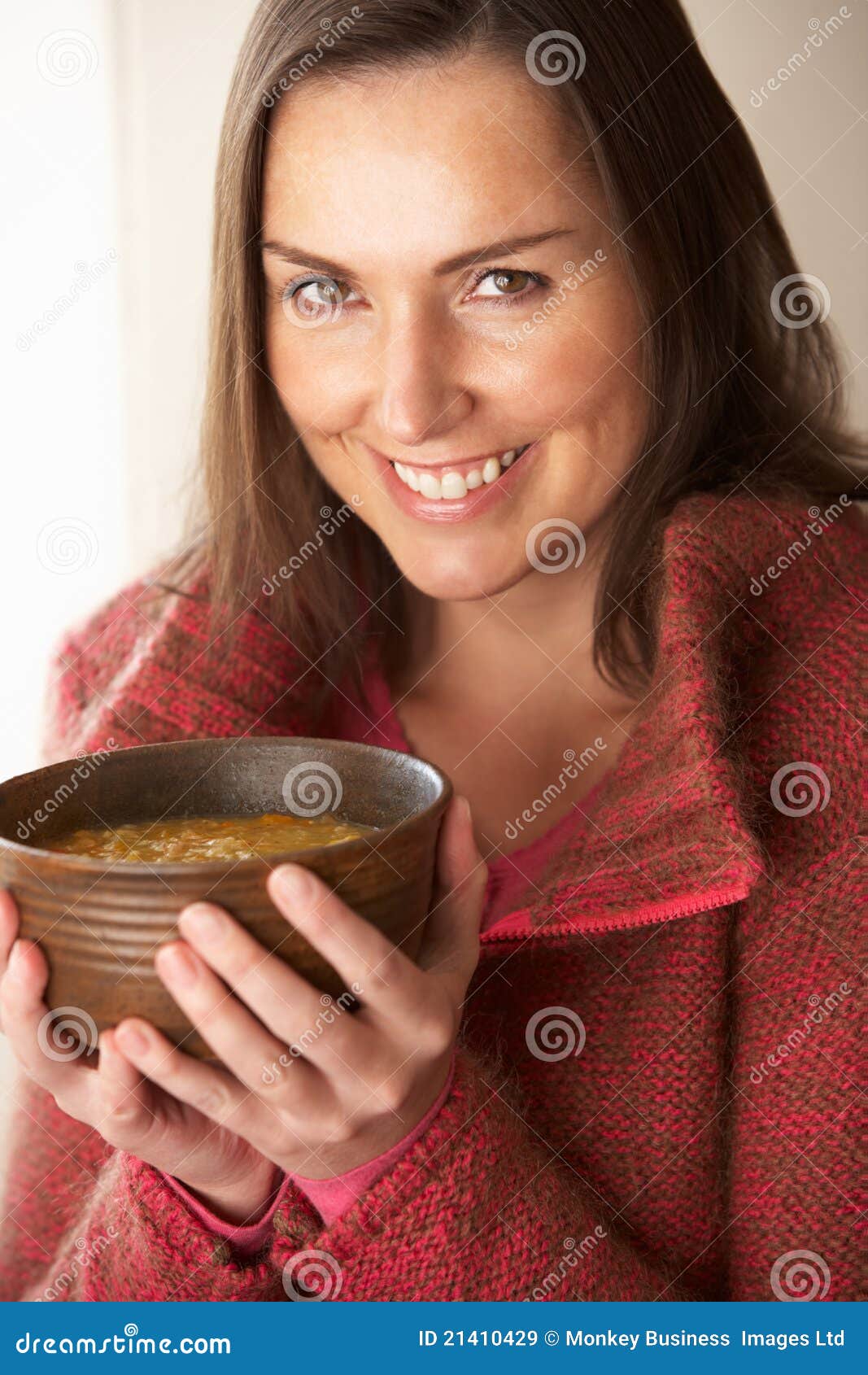 Woman eating bowl of soup stock image. Image of attractive - 21410429