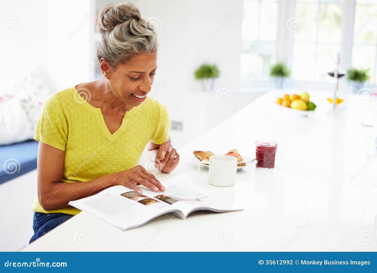 Woman Eating Breakfast and Reading Magazine Stock Photo - Image of food ...