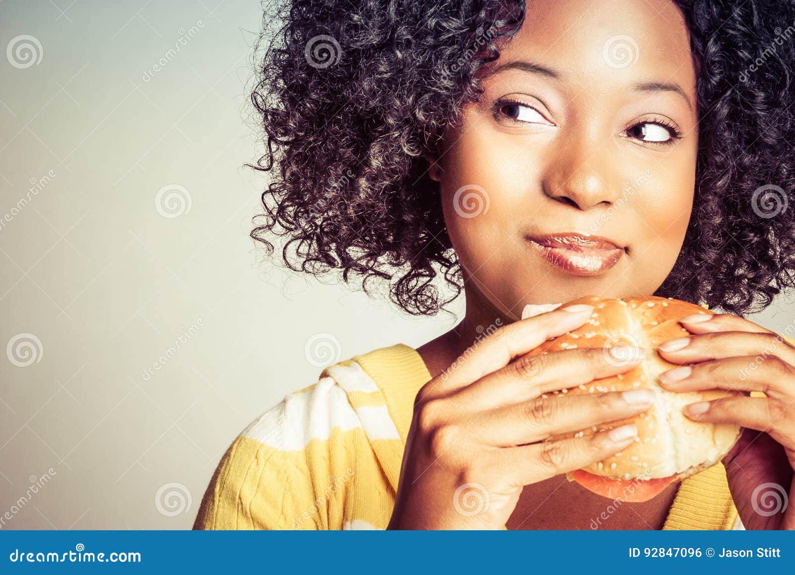 Woman Eating Burger stock photo. Image of space, american - 92847096