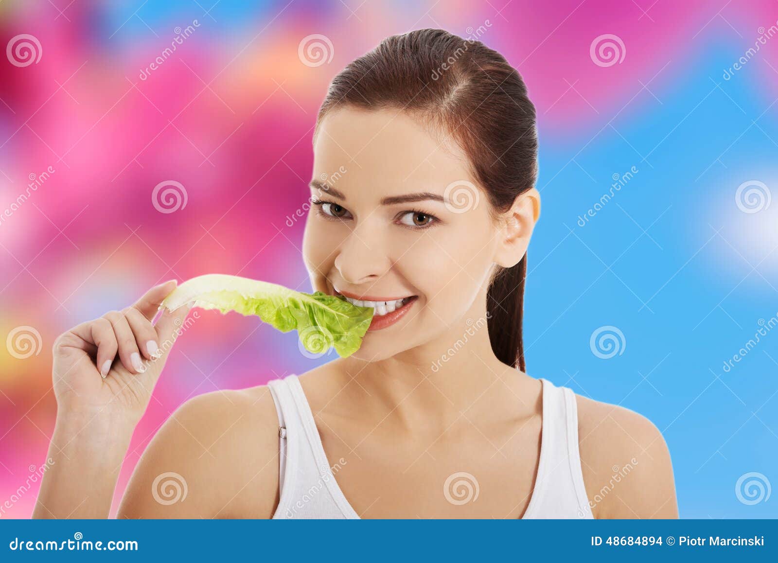 Woman eating a cabbage stock photo. Image of horizontal - 48684894