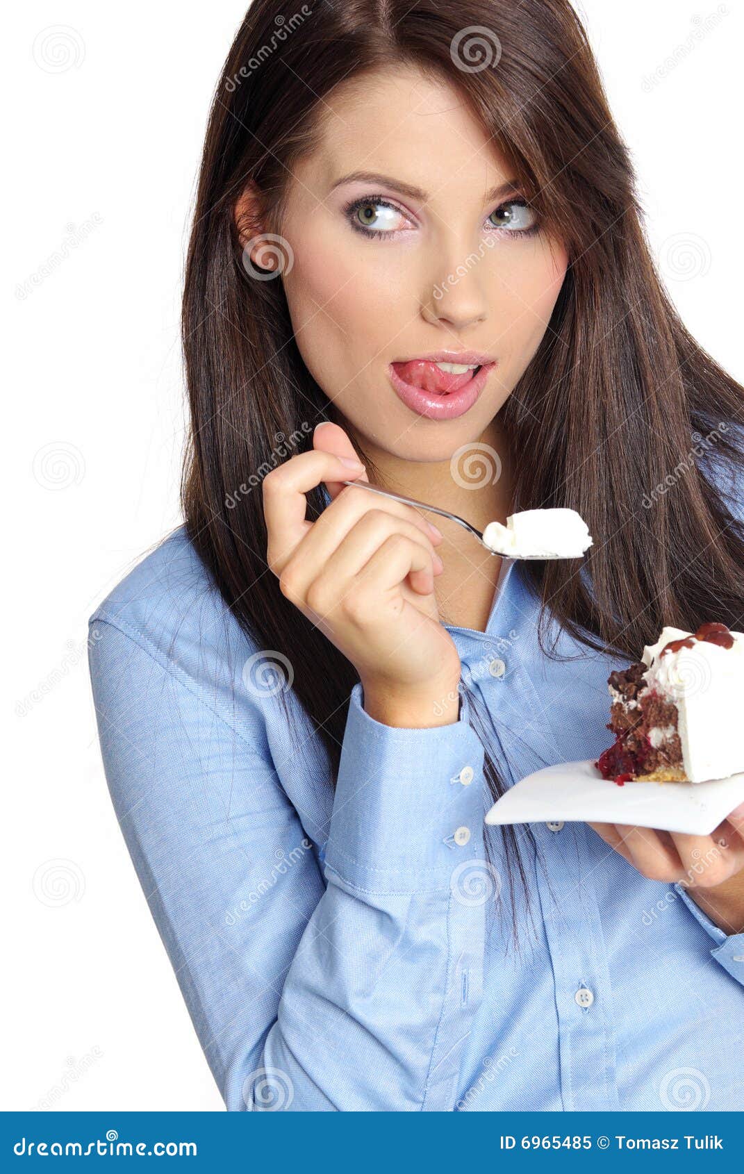 Woman eating the cake. stock image. Image of blue, party - 6965485