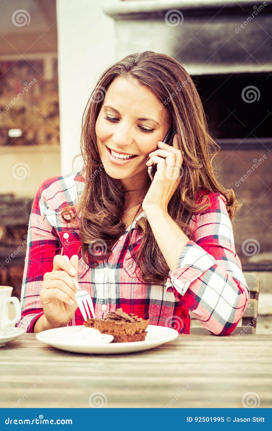 Woman Eating Cake stock image. Image of dessert, phone - 92501995