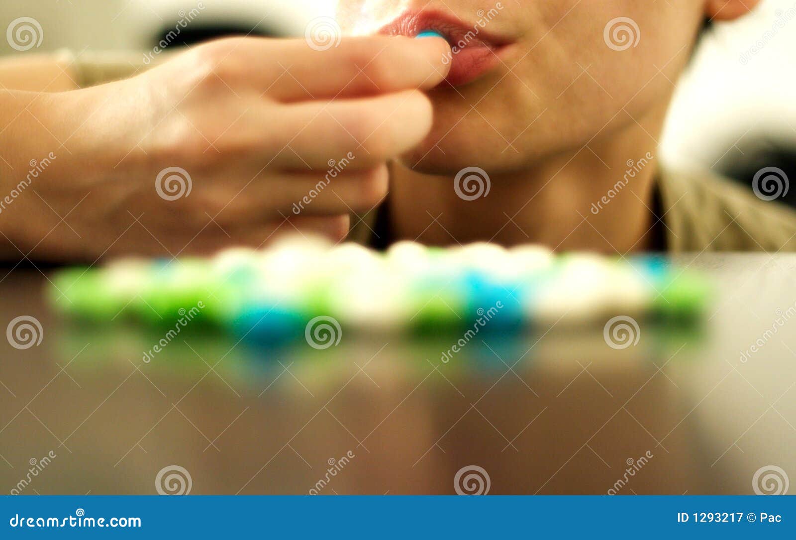 Woman eating candy stock image. Image of eating, hand - 1293217