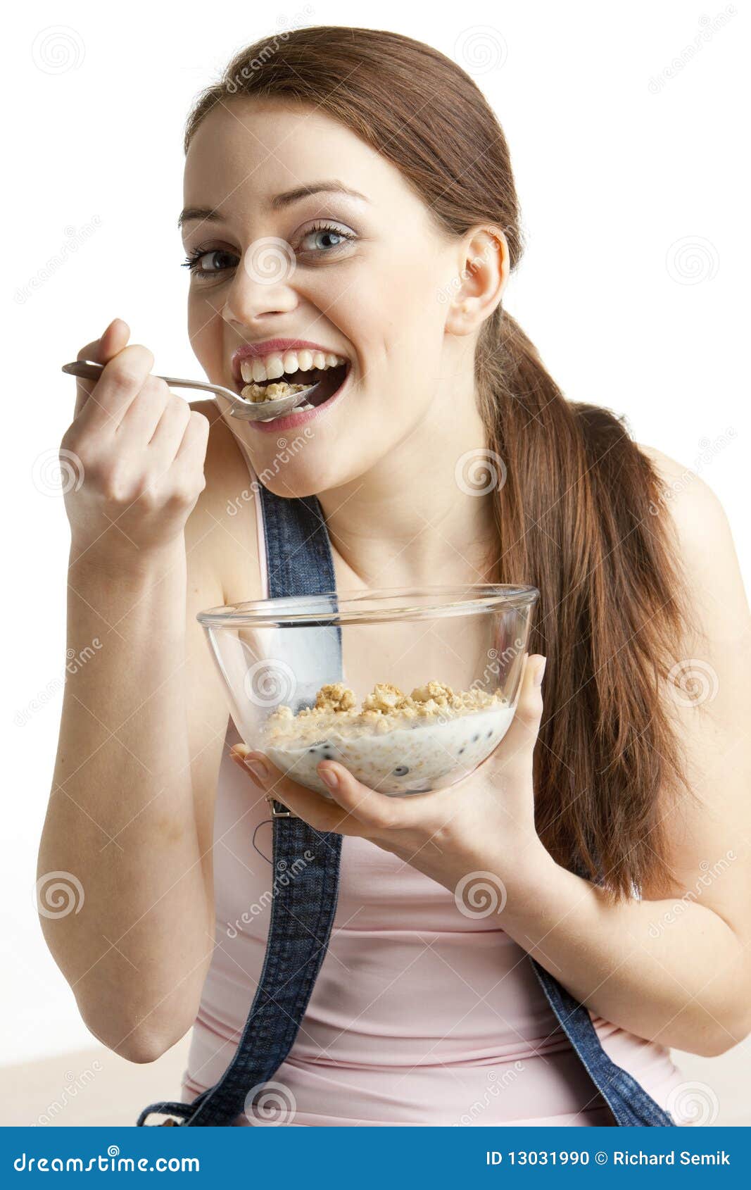 Woman eating cereals stock photo. Image of brunette, haired - 13031990