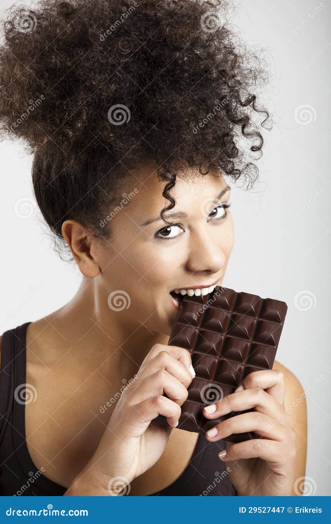 Woman eating chcolate stock image. Image of hold, adult - 29527447