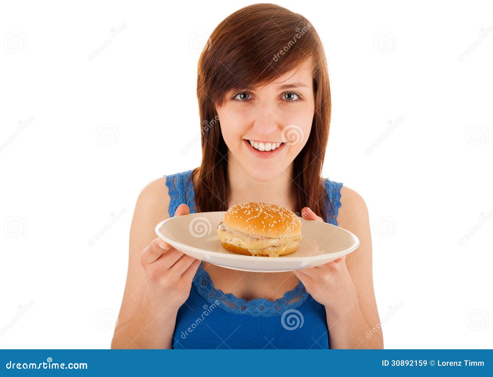 The Woman is Eating a Cheeseburger Stock Image - Image of beauty, young ...