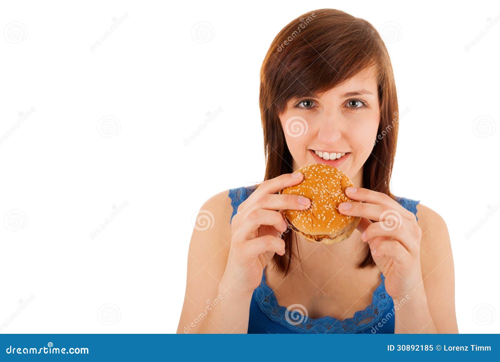 The Woman is Eating a Cheeseburger Stock Image - Image of female, quick ...