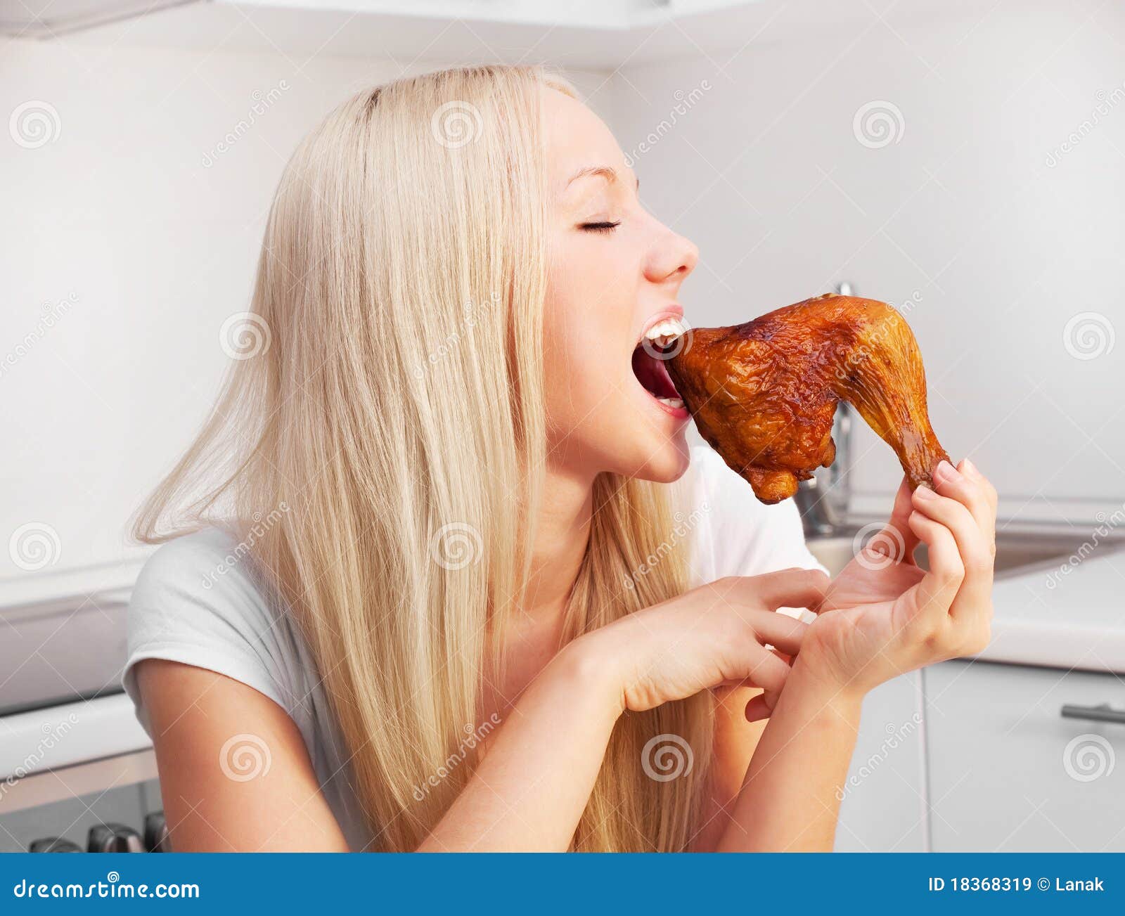 Woman eating chicken stock image. Image of happiness - 18368319