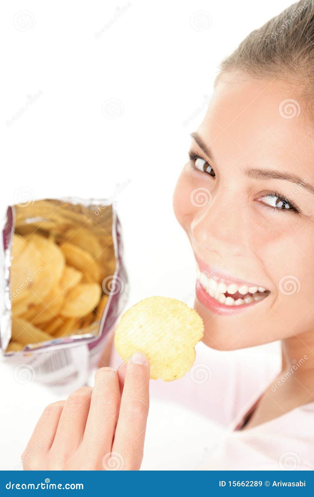 Woman eating chips stock image. Image of chip, indulgence - 15662289